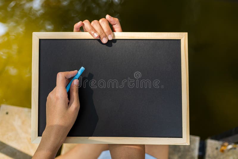 Hands Use Chalk for Drawing, Writing Balckboard in the Parks. Education ...