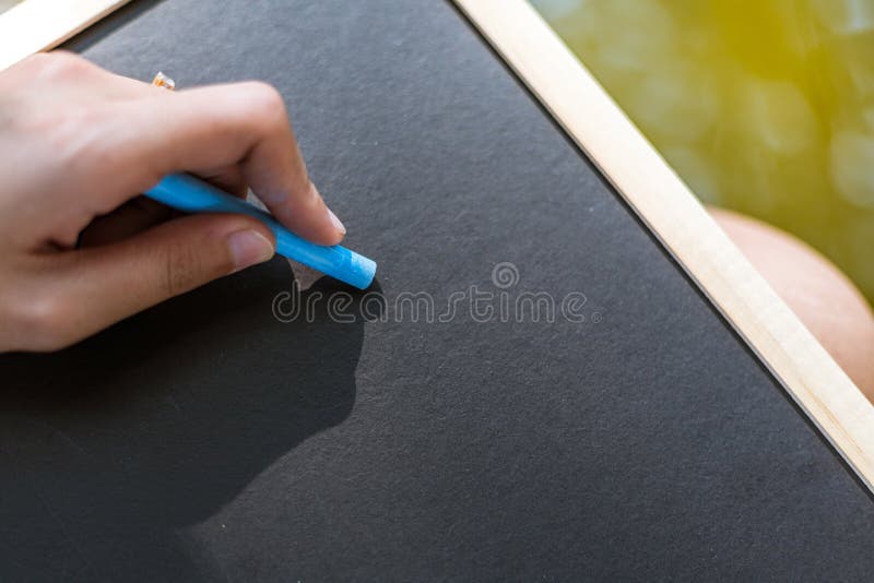 Hands Use Chalk for Drawing, Writing Balckboard in the Parks. Education ...