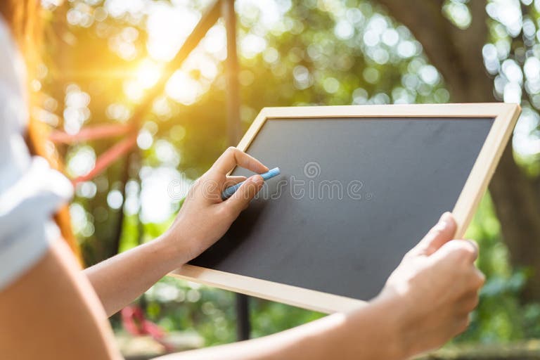 Hands Use Chalk for Drawing, Writing Balckboard in the Parks. Education ...