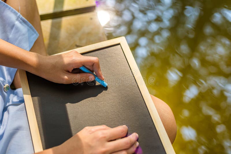 Hands Use Chalk for Drawing, Writing Balckboard in the Parks. Education ...