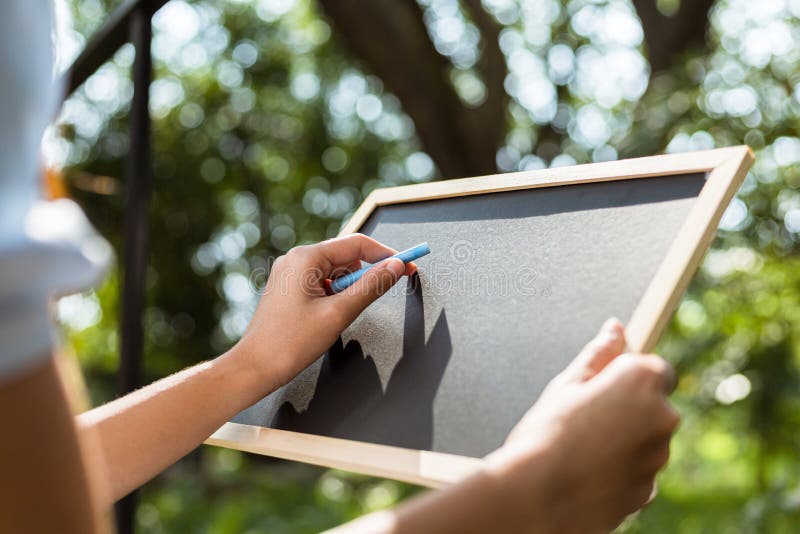 Hands Use Chalk for Drawing, Writing Balckboard in the Parks. Education ...