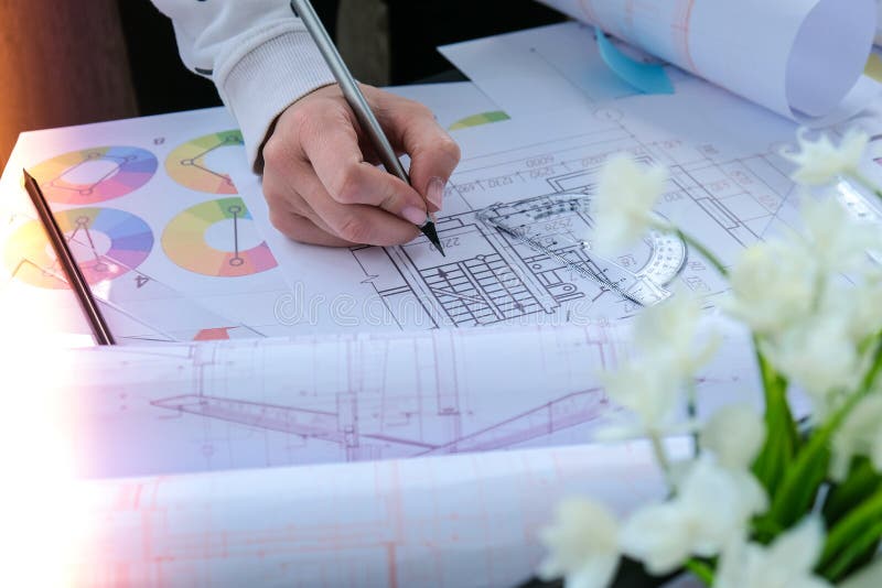Hands Use Pencil with a Protractor. Architectural Project Drawings with ...