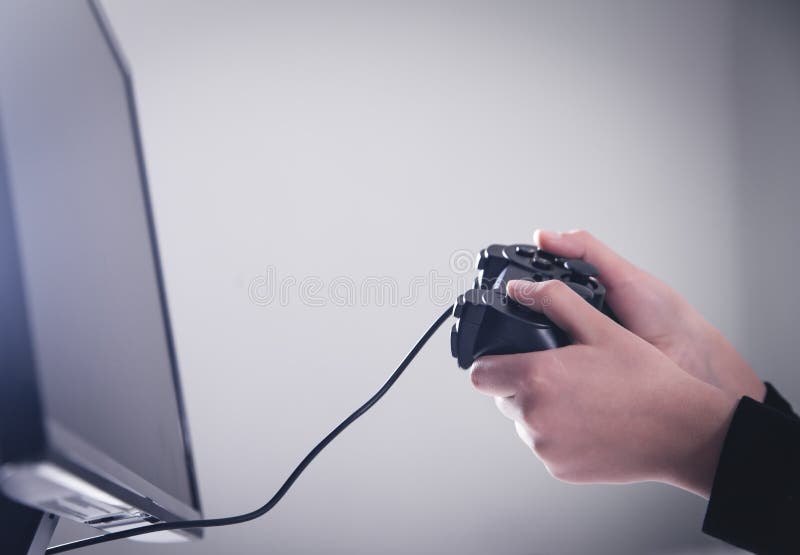 Hands Using Game Controller. Playing Video Games Stock Photo - Image of ...