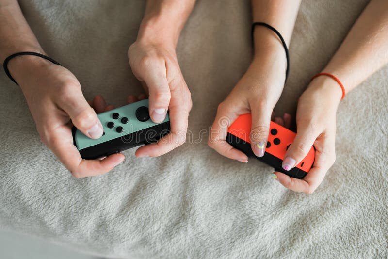 Hands Using Game Controller. Playing Video Games Stock Photo - Image of ...