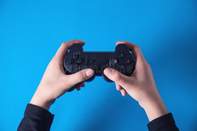 Hands Using Game Controller. Playing Video Games Stock Image - Image of ...