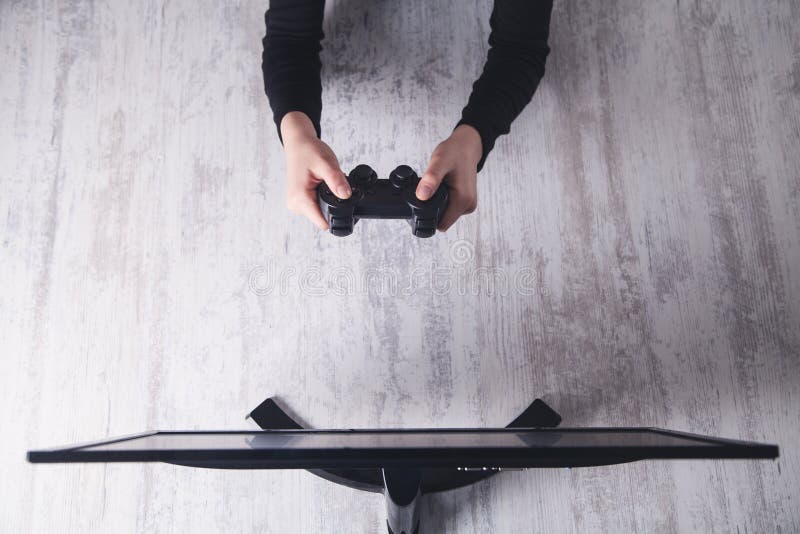 Hands Using Game Controller. Playing Video Games Stock Photo - Image of ...