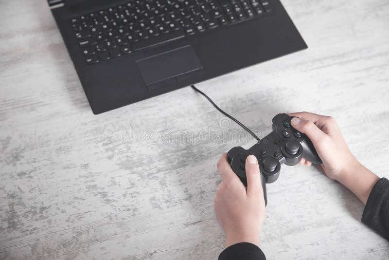 Hands Using Game Controller. Playing Video Games Stock Photo - Image of ...