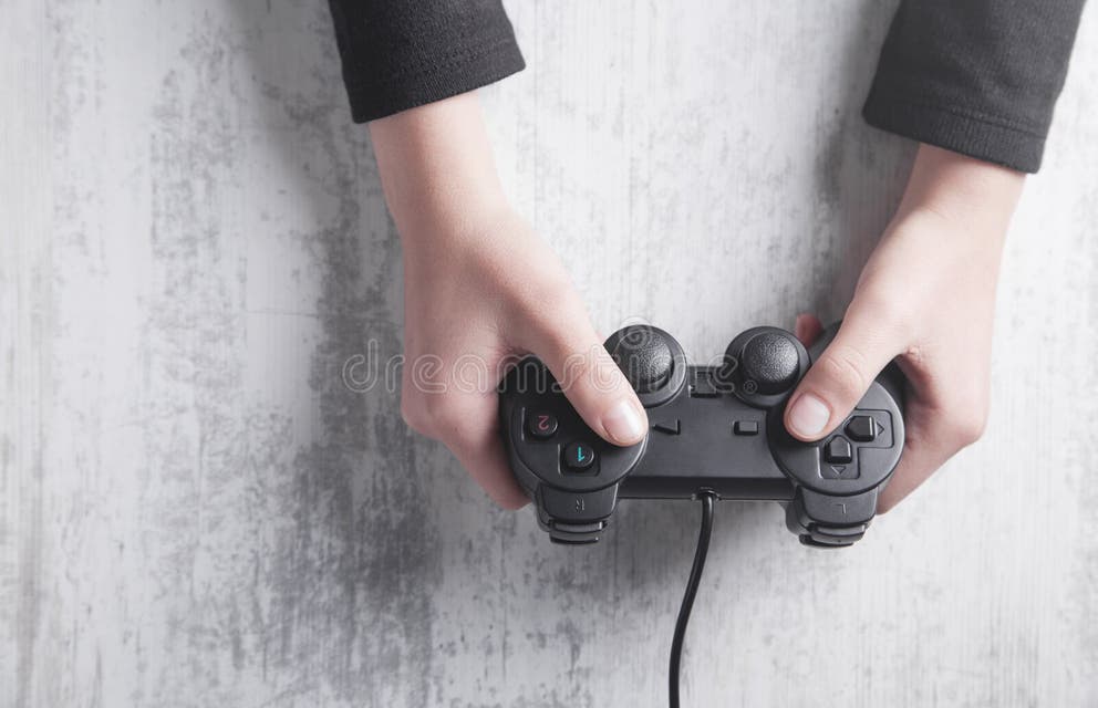 Hands Using Game Controller. Playing Video Games Stock Image - Image of ...