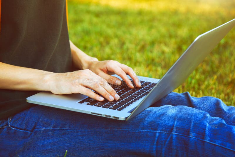 Hands using laptop typing stock image. Image of digital - 56582805