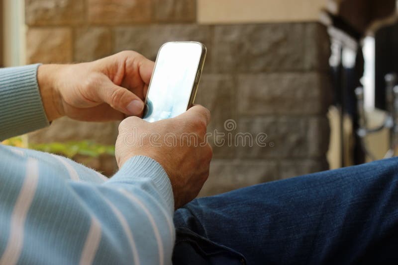 Hands using mobile phone stock photo. Image of home, application - 68040160