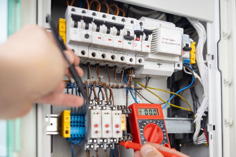 Electrician Using Multimeter Electrical Panel Safety Inspection ...