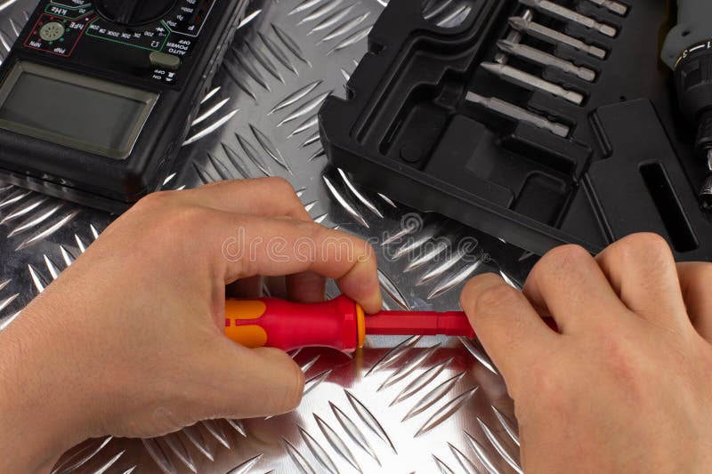 Hands Using Screwdriver with Tools Top View Stock Image - Image of ...