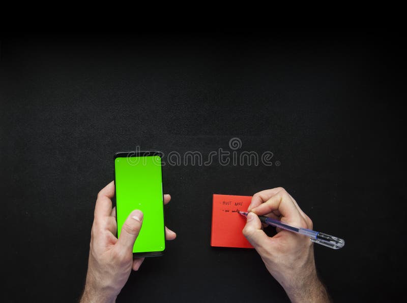 Hands Using Smart Phone and Noting Down on Sticky Notes Stock Image ...
