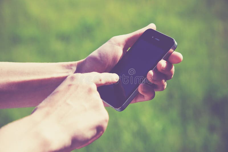 Hands using smartphone app stock photo. Image of device - 55085046