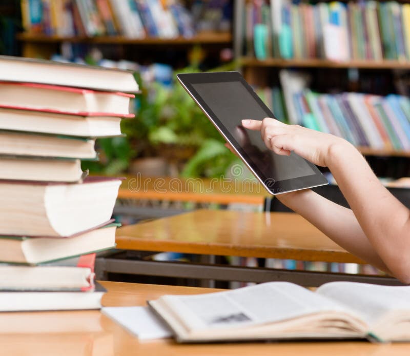 Hands Using Tablet Computer in Library Stock Image - Image of ...