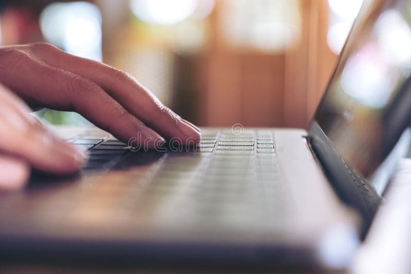 Hands Using and Typing on Laptop Keyboard on the Table Stock Photo ...