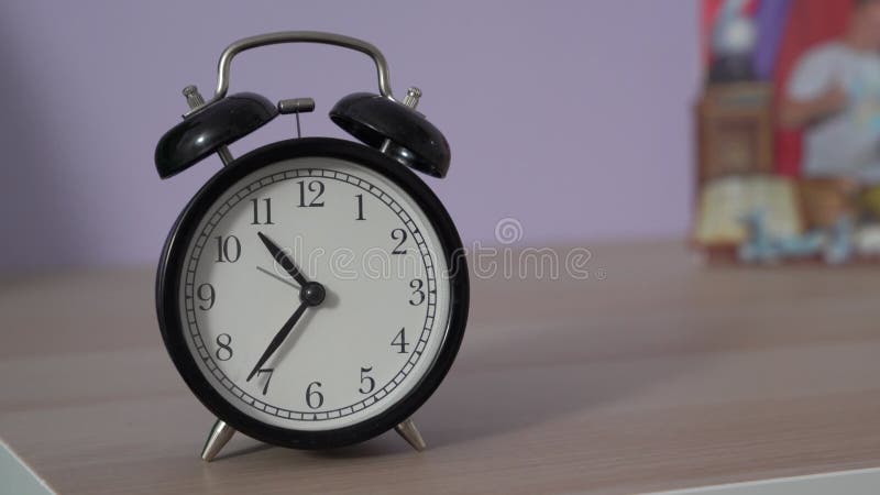 The Hands of Vintage Alarm Clock Quickly Move Backwards As Metaphor for ...