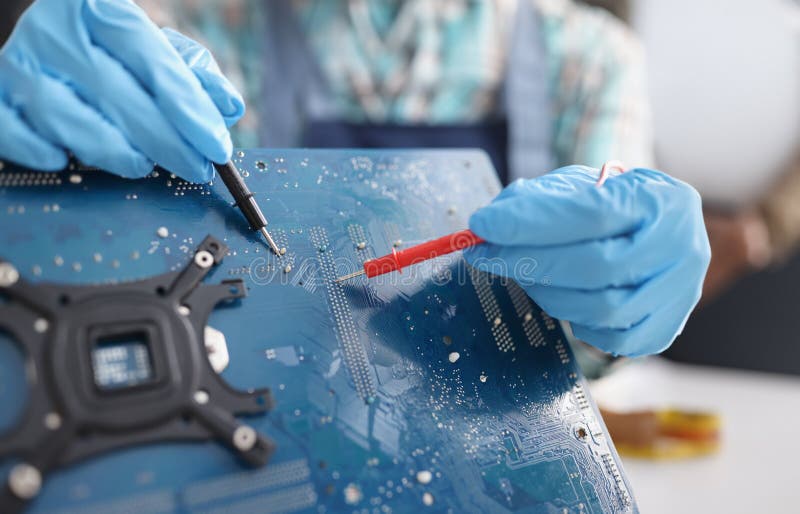 Hands with a Voltmeter Check the Processor Chip Stock Photo - Image of ...