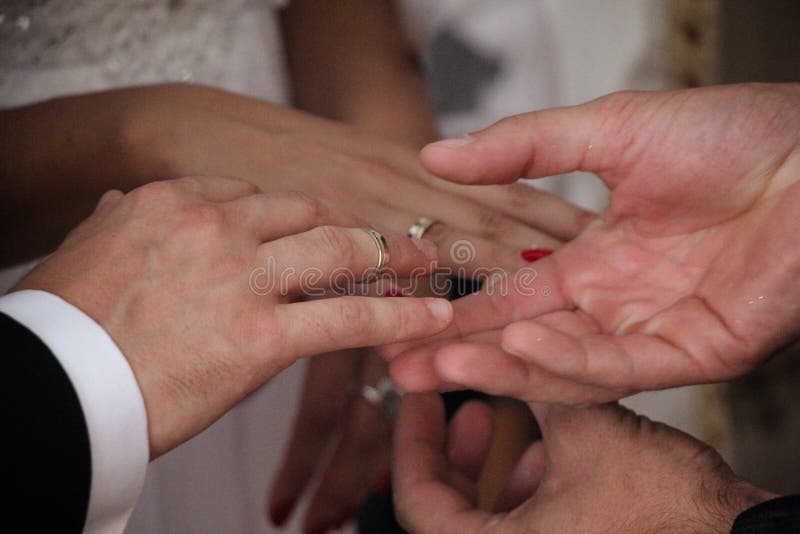 Hands and wedding rings stock image. Image of preparation - 45141561