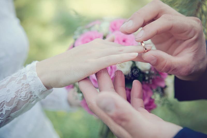 Hands with wedding rings stock image. Image of culture - 50564969