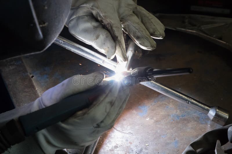 Hands of the Welder Solder and Connect the Parts Stock Photo - Image of ...