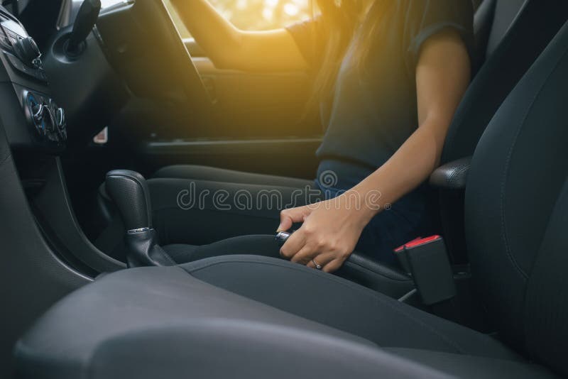 Hand Woman Driver Pulling the Hand Brake Inside Modern Car Stock Photo ...