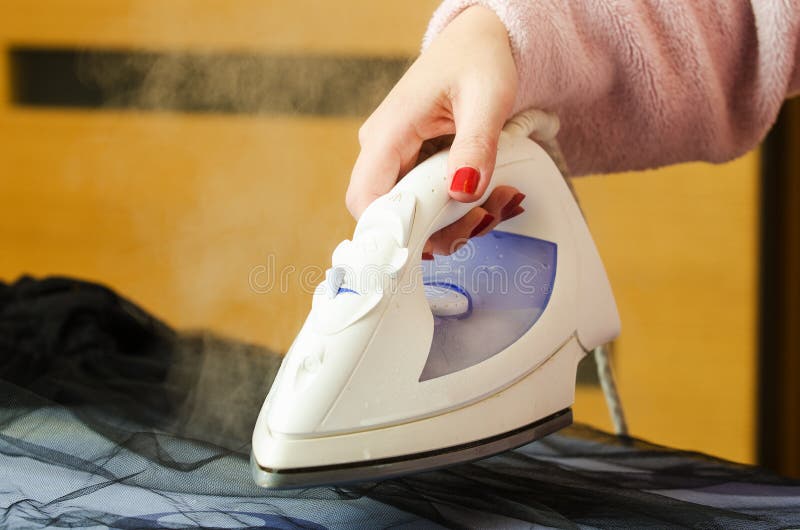 Hands of Woman in Ironing Process Stock Photo - Image of labor, board ...