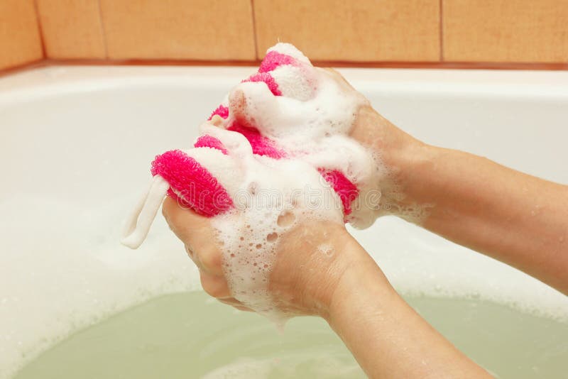 Hands of Woman Lathering Striped Sponge with Soap Stock Image - Image ...