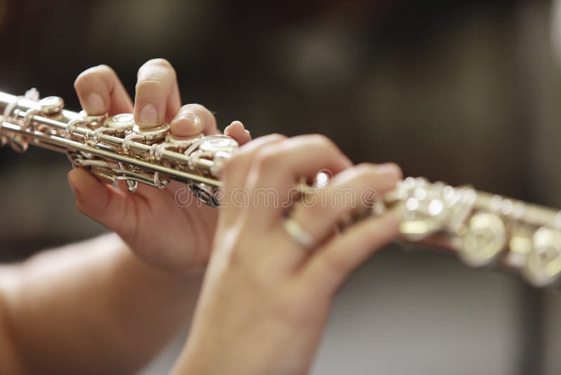 Hands of Woman Playing the Flute Stock Image - Image of music ...