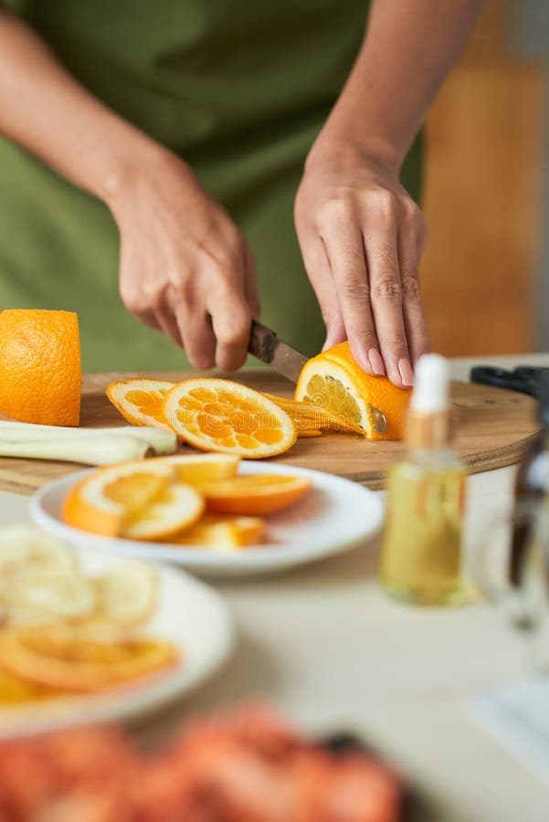 Slicing an Orange To Make Fresh Orange Juice. Healthy Lifestyle Comcept ...