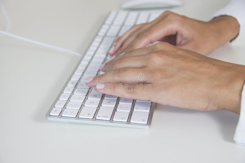 Hands of a Woman Typing on a Keyboard Stock Photo - Image of hand ...