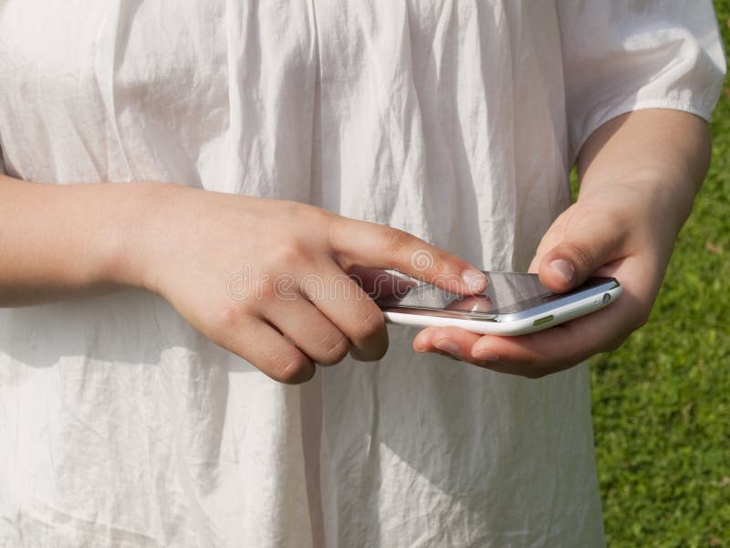 Hands of a Woman Using Cellular Phone Stock Photo - Image of asian ...