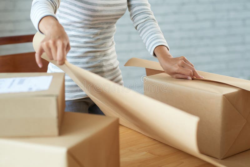 Wrapping process stock image. Image of cardboard, parcel - 121629241