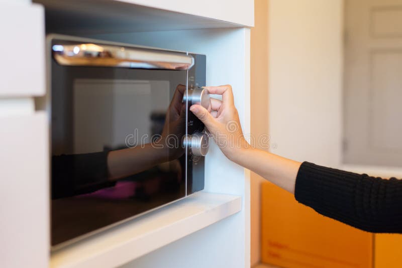 Hands Woman Using Microwave Oven in Home Kitchen Stock Photo - Image of ...