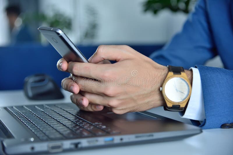 Hands with Wooden Watch Using Mobile Phone Stock Photo - Image of ...