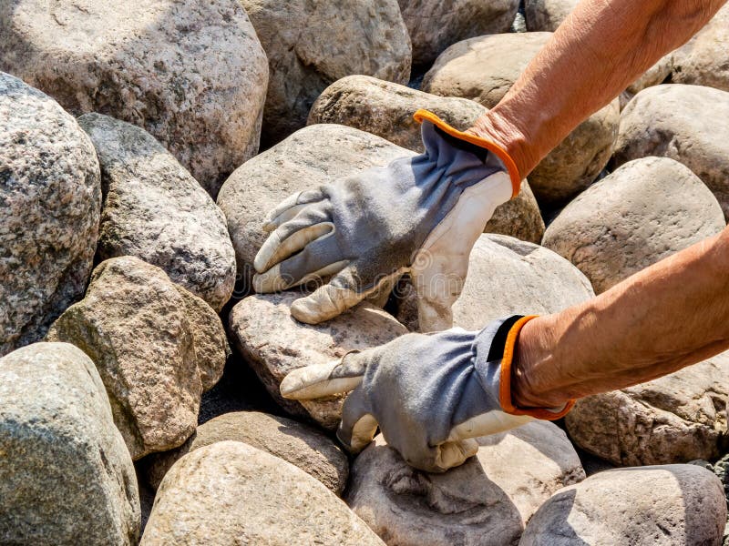Stone workers stock image. Image of setting, person, gloves - 29754347