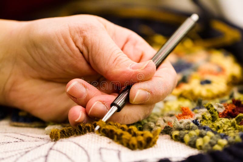 Rug hooking stock photo. Image of hands, woven, hooking - 288246254