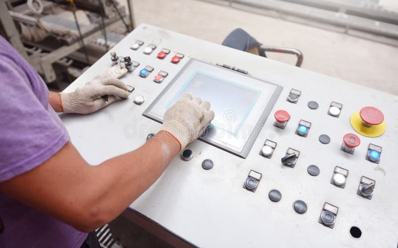 Hands of a Worker on a Control Panel of a Brick Conveyor. Close-up ...