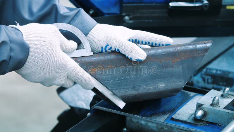 Engineer Measuring Angles of Metal Blank by Protractor Angle Finder ...