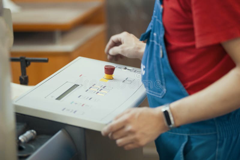 Hands of the Worker Over the Control Panel of Printing Machine Stock ...
