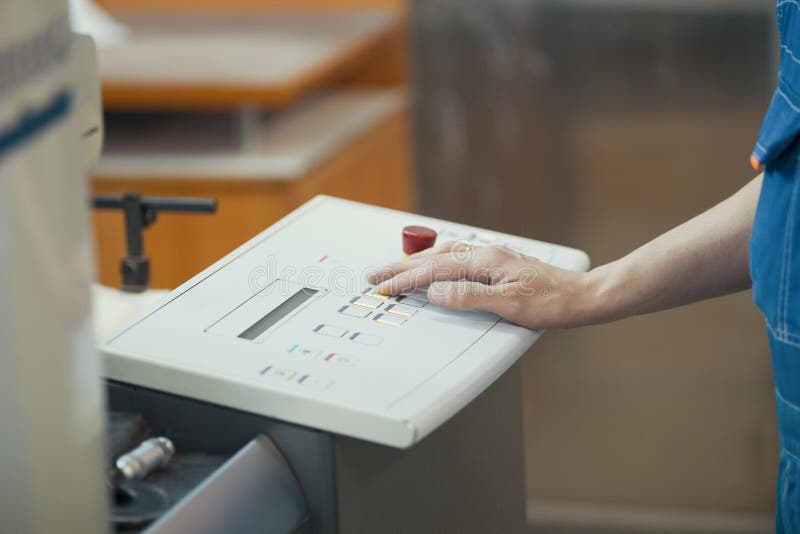 Hands of the Worker Presses the Buttons on Control Panel of Printing ...