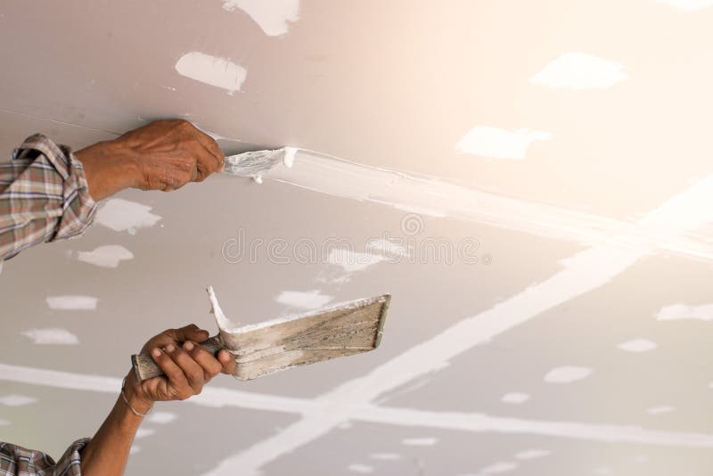 Hands of Workers are Repairing the Ceiling Stock Photo - Image of hole ...