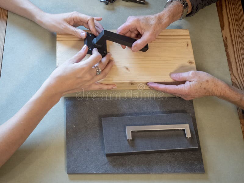 Hands of Workers Trying a Handle Stock Photo - Image of natural ...