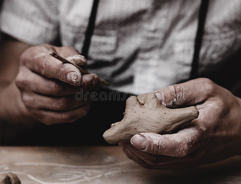 Hands working with clay stock image. Image of material - 86108243
