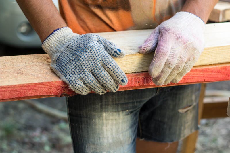 Hands Working on the Construction of the House Stock Image - Image of ...