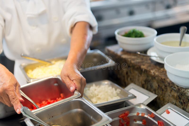 Hands working in kitchen stock photo. Image of tomato - 25148556