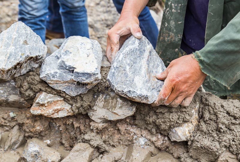 Hands Working on Masonry Stone Wall Stock Photo - Image of ancient ...