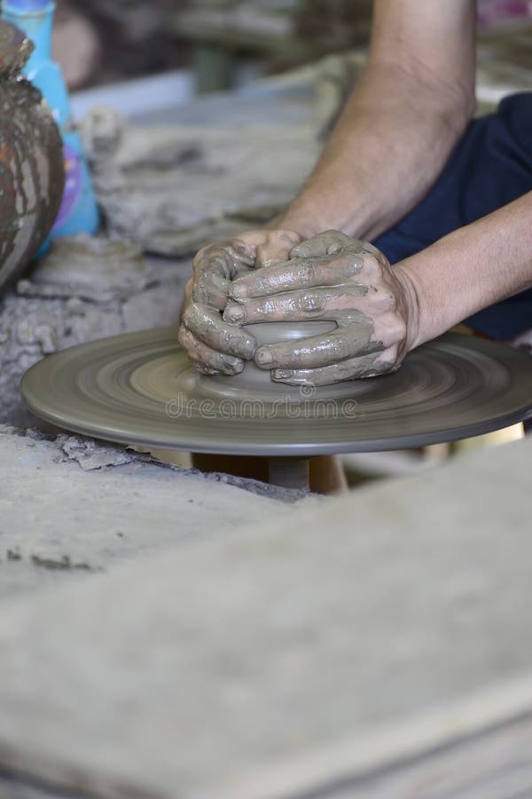 Hands Working on Pottery Wheel Stock Image - Image of paste, artist ...