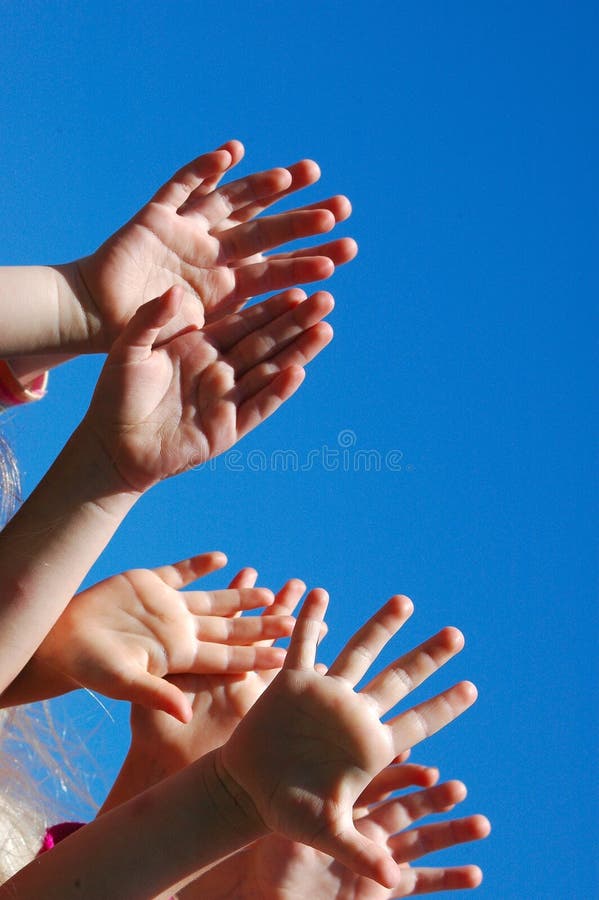 Hands of worshipping kids stock image. Image of caucasian - 6044655