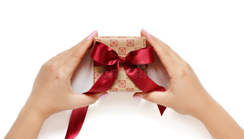 Hands with wrapped present stock photo. Image of isolated - 201640174